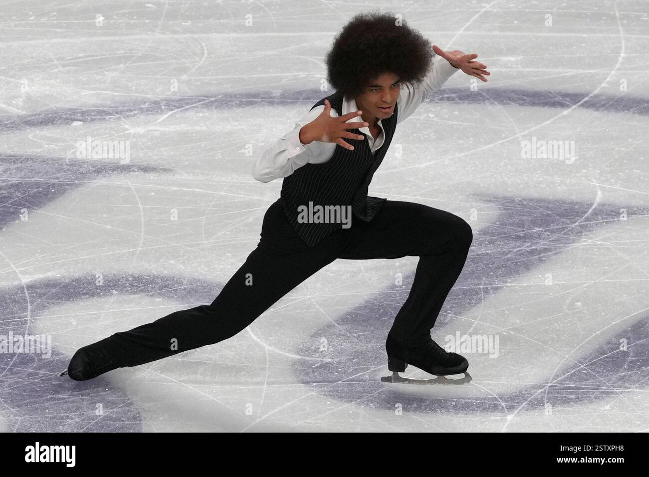 Darian Kaptich of Australia performs during the men's short program in ...