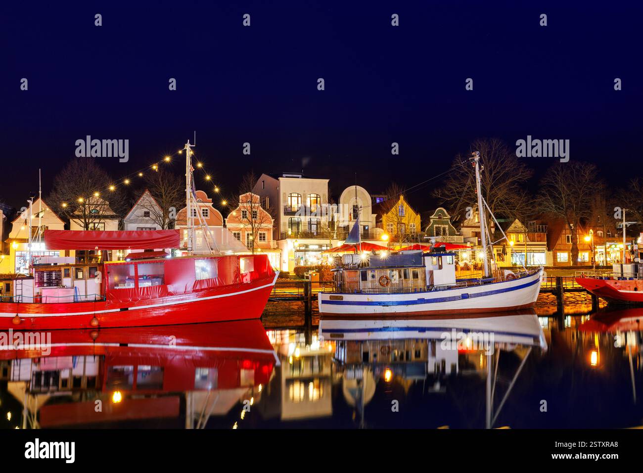 Traditional old german fishing boats cafe moored Alter Strom Canal ...
