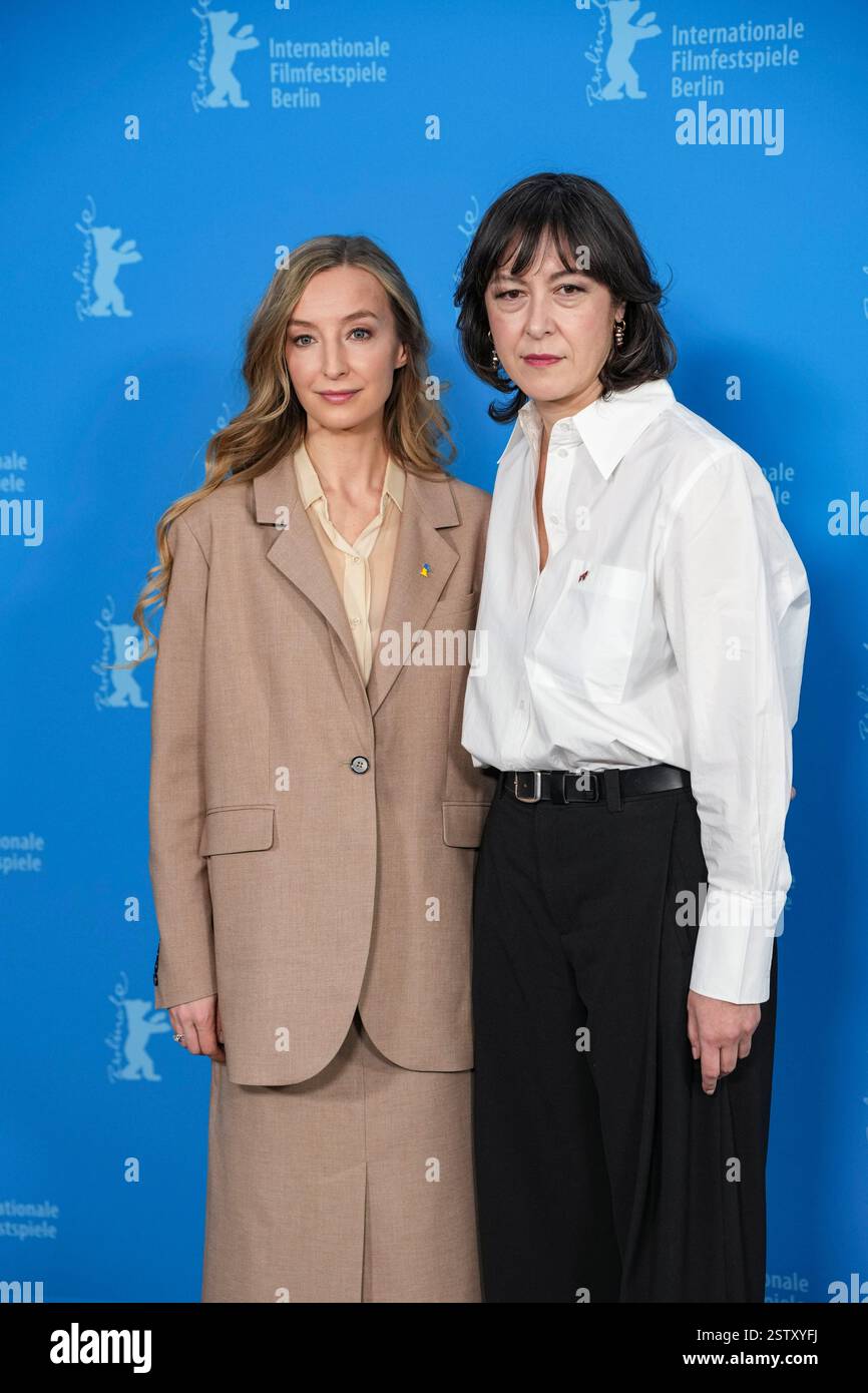 Producers Olha Bregman, left, and Natalia Libet pose for photographers ...