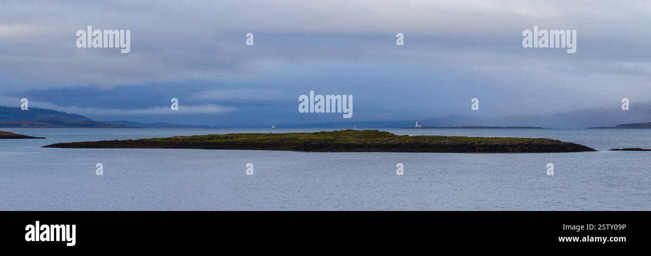 Panoramic image of a tiny island off the coast of Kerrera with the Isle ...