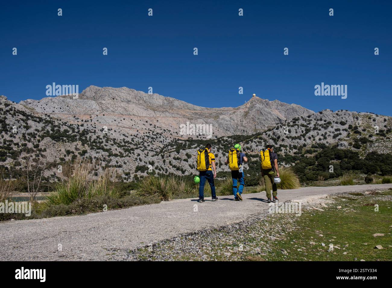 Three runners in long distance route GR 221 Stock Photo - Alamy