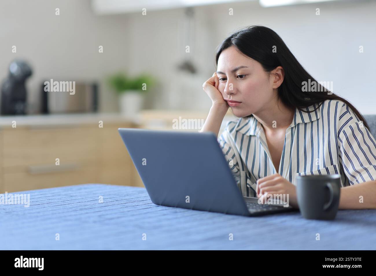 Sad woman checking bad hi-res stock photography and images - Alamy