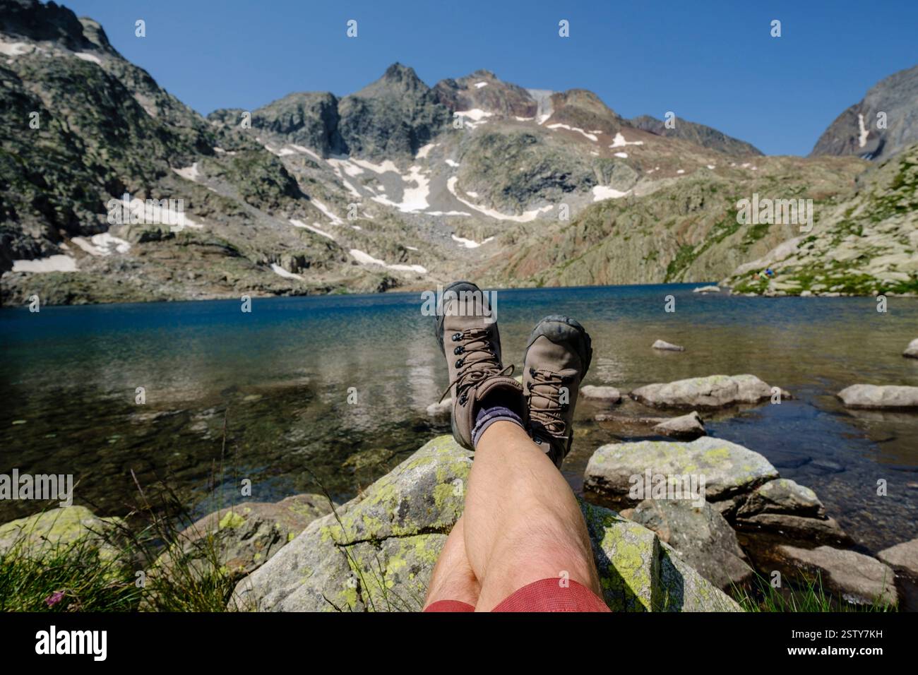 feet in boots relaxing, Ibones azules and Bachimaña alto route, Huesca ...