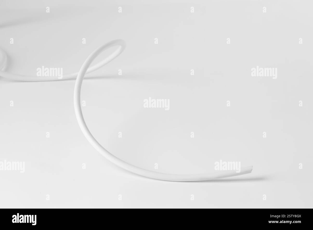 One insulated electrical wire isolated on white Stock Photo - Alamy