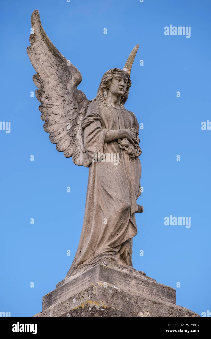 Angels of the main portal Stock Photo - Alamy