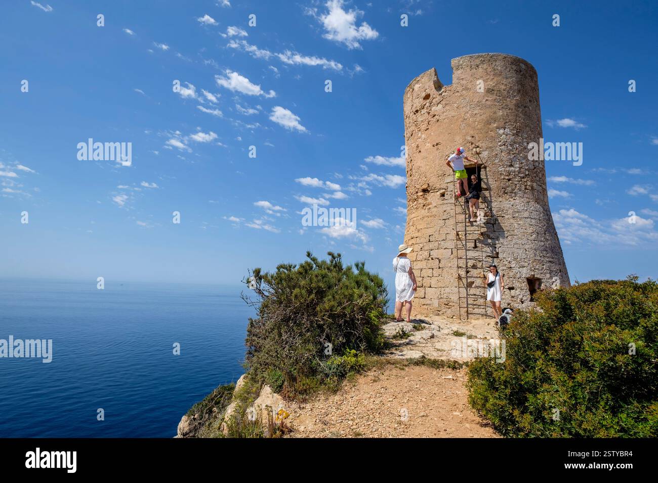 Tourists visiting Cap Blanc tower built in 1579 Stock Photo - Alamy