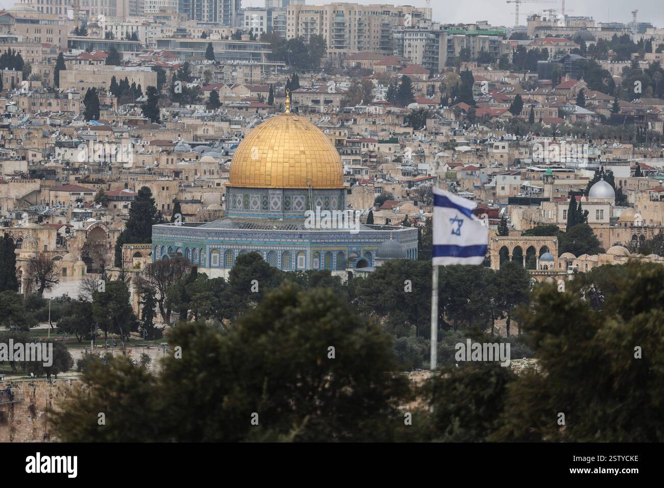 general view An Israeli flag is seen in the foreground, with the golden ...