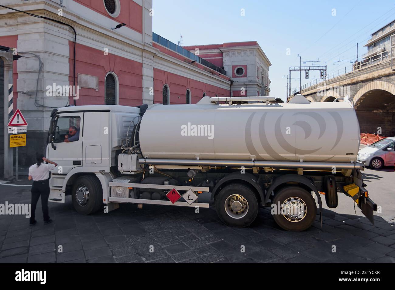Catania, Italy - February 20, 2025: A white fuel tanker truck with ...