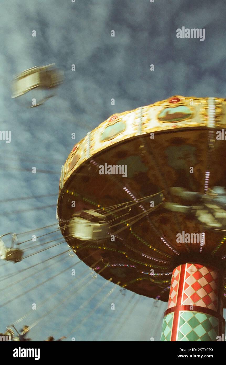 amusement park in Tirana. Trolley parks. Ferris wheels Stock Photo - Alamy