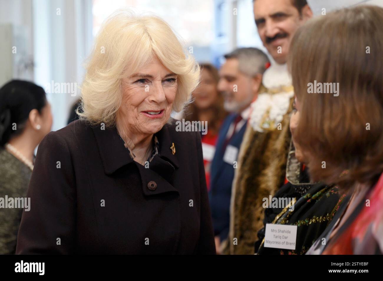 Queen camilla talks guests hi-res stock photography and images - Alamy