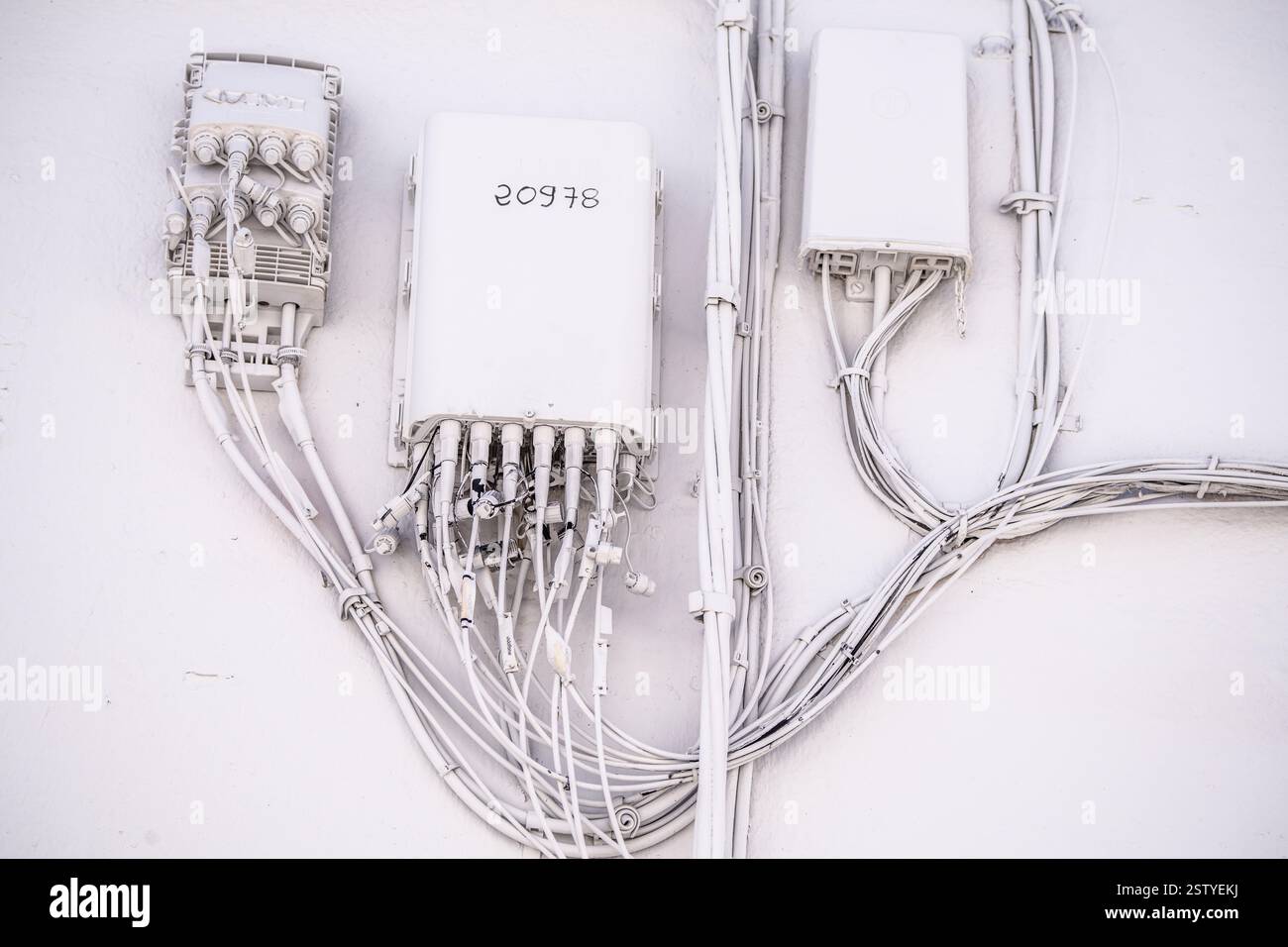 Electrical wiring on a facade Stock Photo - Alamy