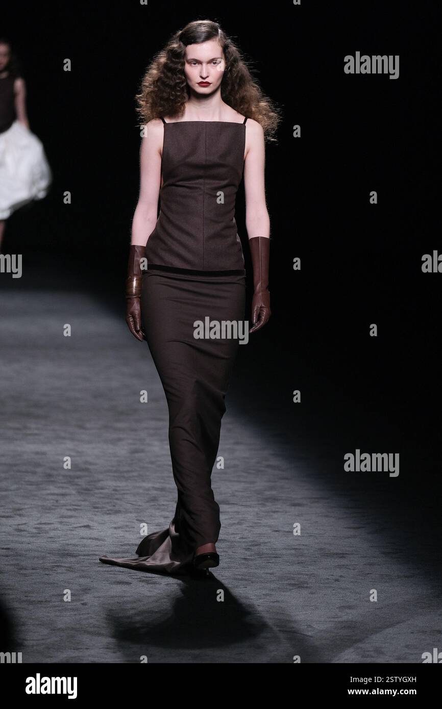 A model walks the runway wearing a design by Baro Lucas during Mercedes ...