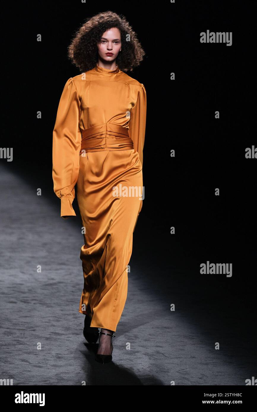 A model walks the runway wearing a design by Baro Lucas during Mercedes ...