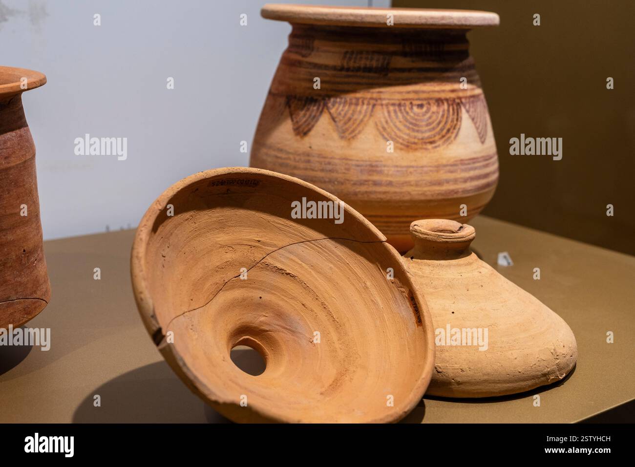 Kalathos-type urn with painted decoration and funnel-lids 5th-3rd ...