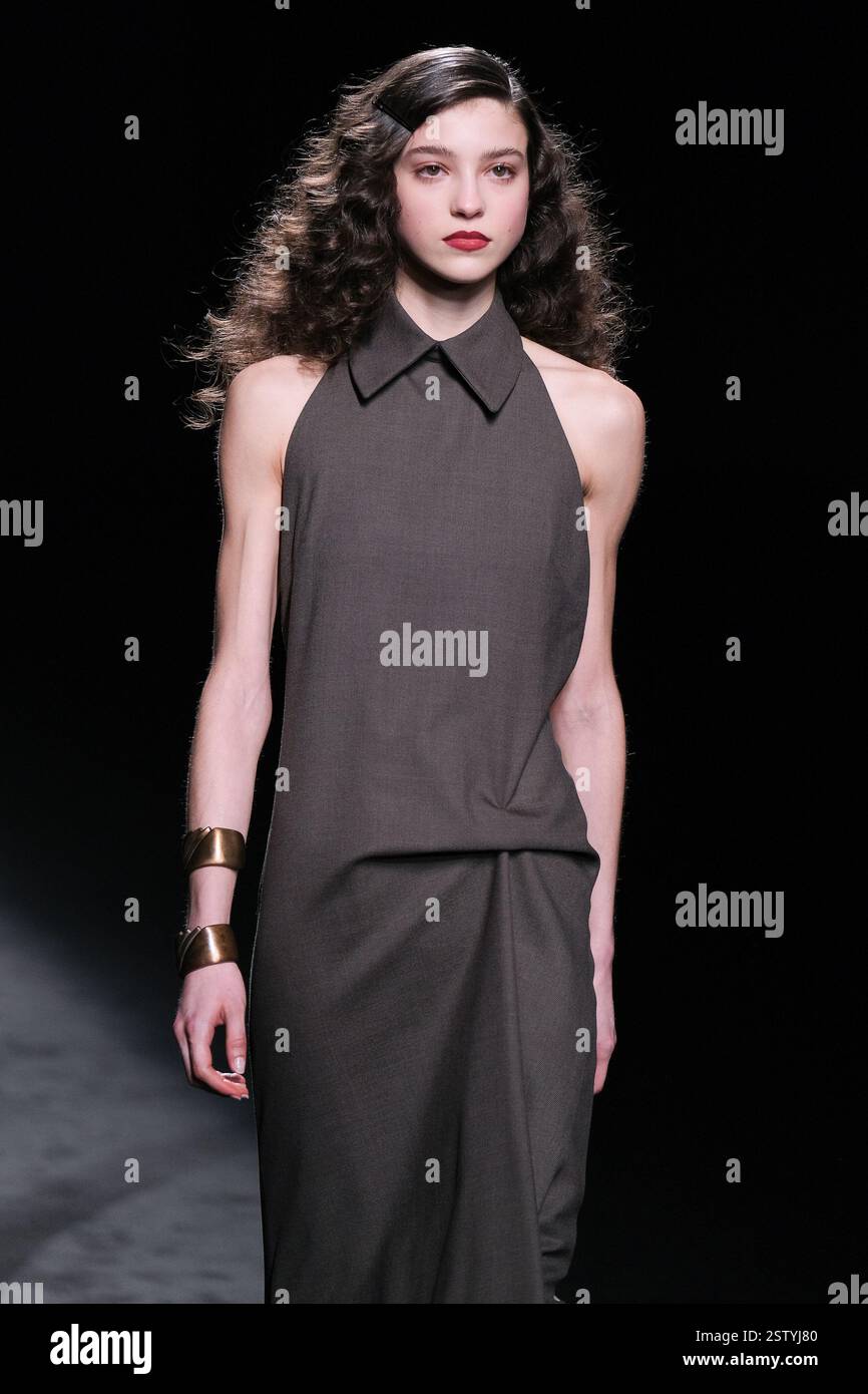 A model walks the runway wearing a design by Baro Lucas during Mercedes ...