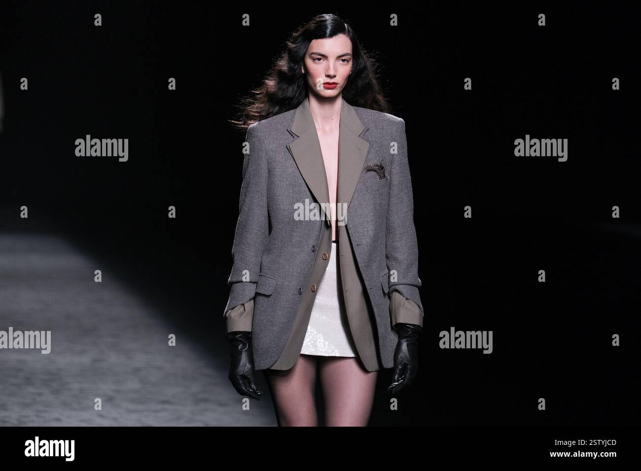 A model walks the runway wearing a design by Baro Lucas during Mercedes ...