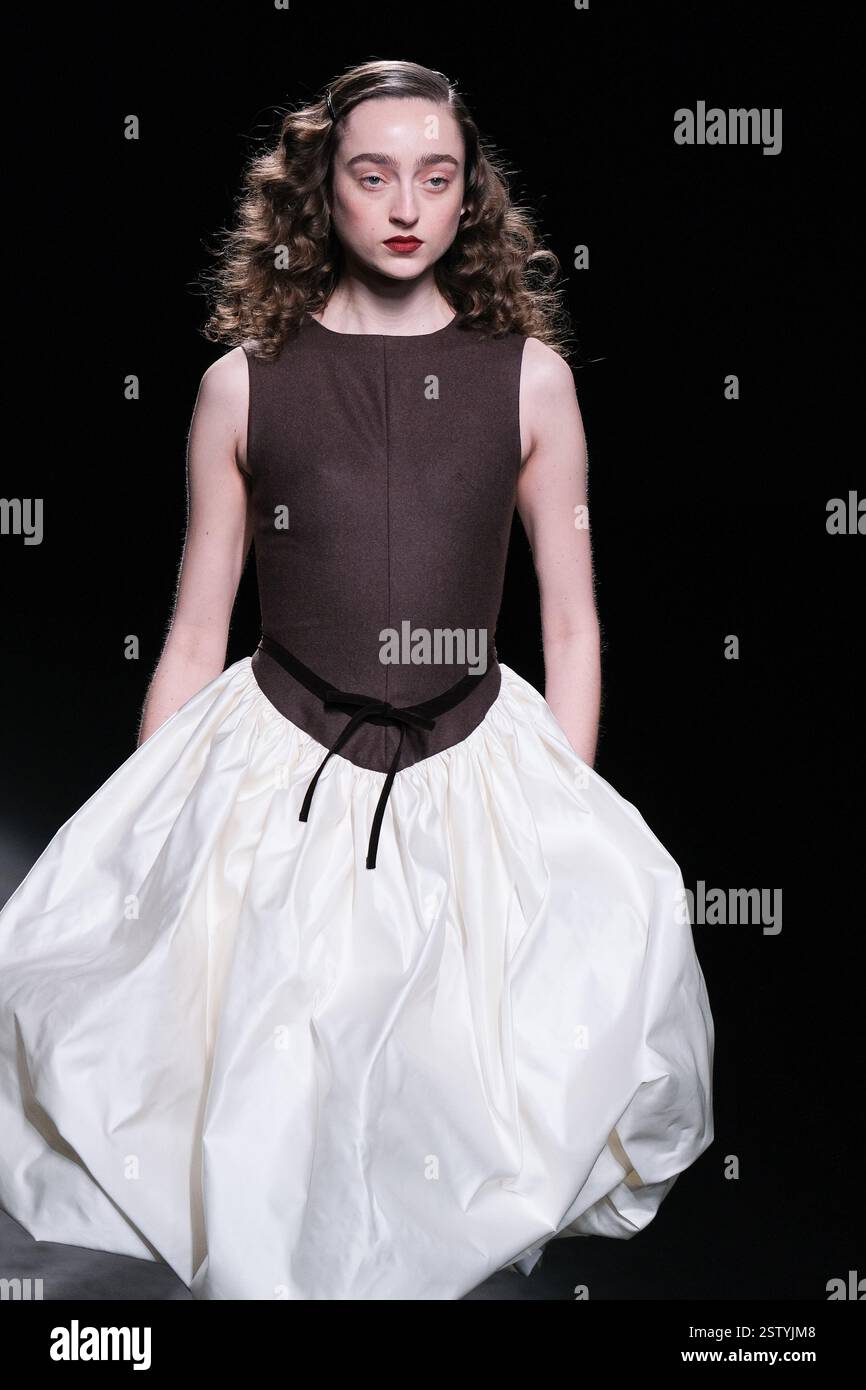 A model walks the runway wearing a design by Baro Lucas during Mercedes ...