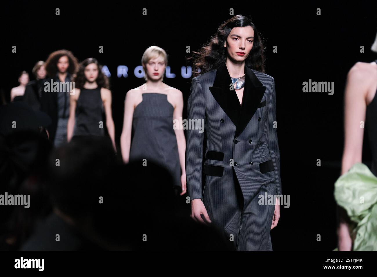 A model walks the runway wearing a design by Baro Lucas during Mercedes ...