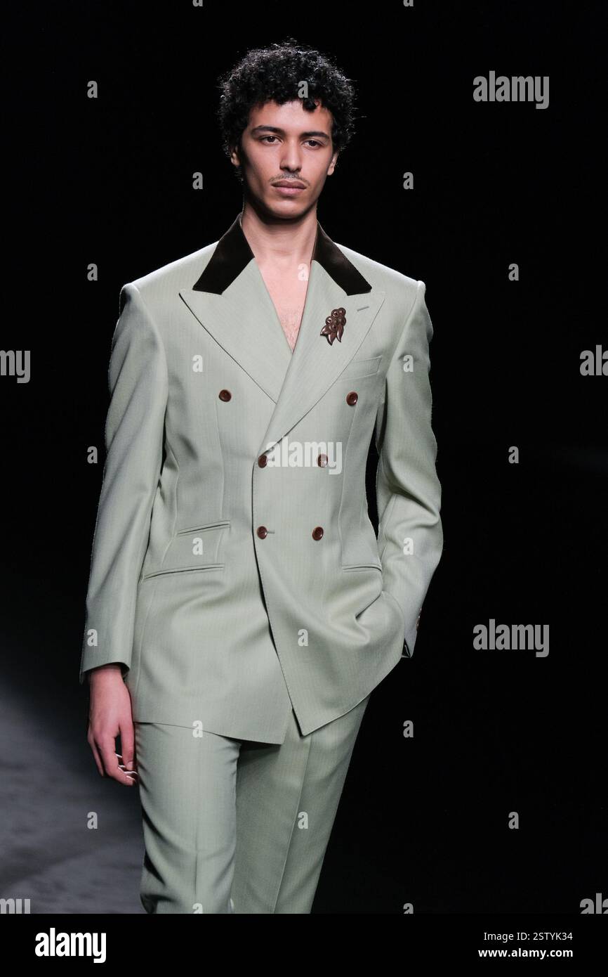 A model walks the runway wearing a design by Baro Lucas during Mercedes ...