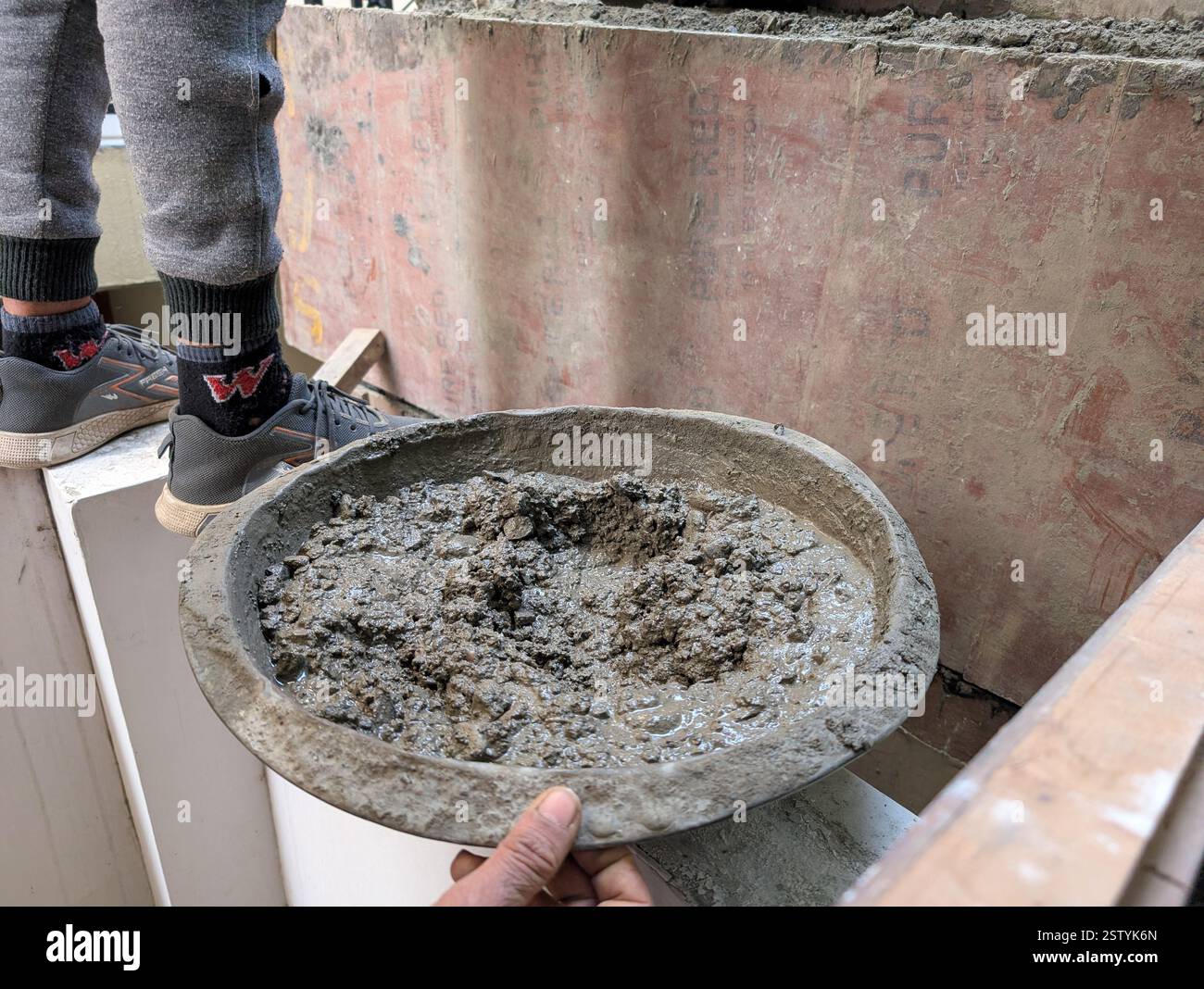 Feb15th2025 Dehradun Uttarakhand India.. Handmixed construction cement ...