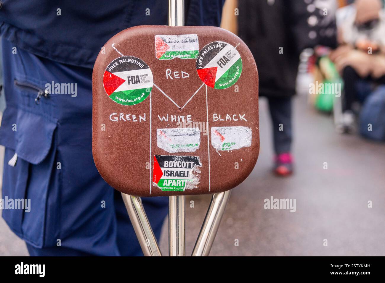 Samlesbury, UK. 20 FEB, 2025. Chair with a number of faded palestine ...