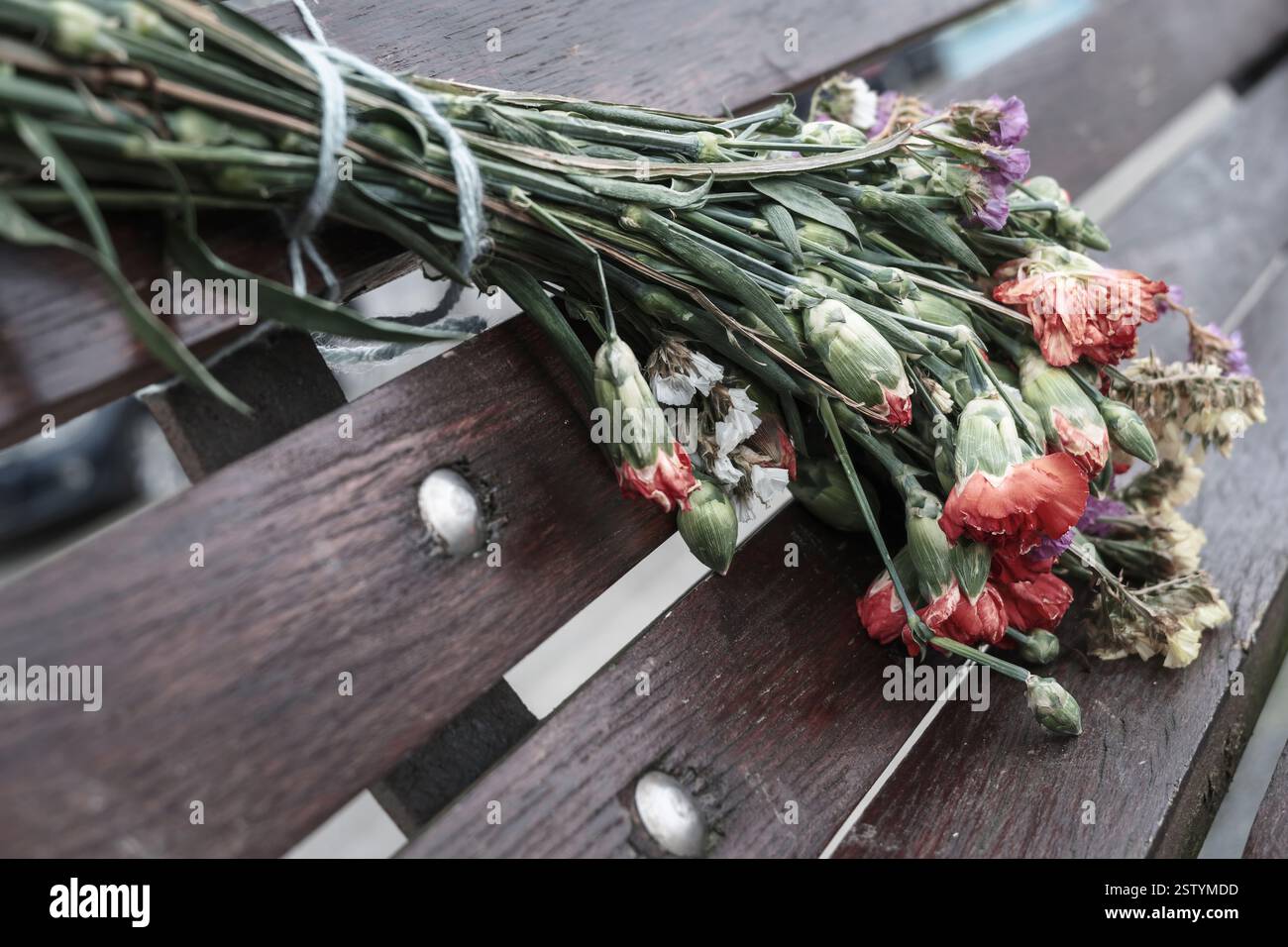 Appledore, North Devon - A floral tribute placed on a bench on the quay ...