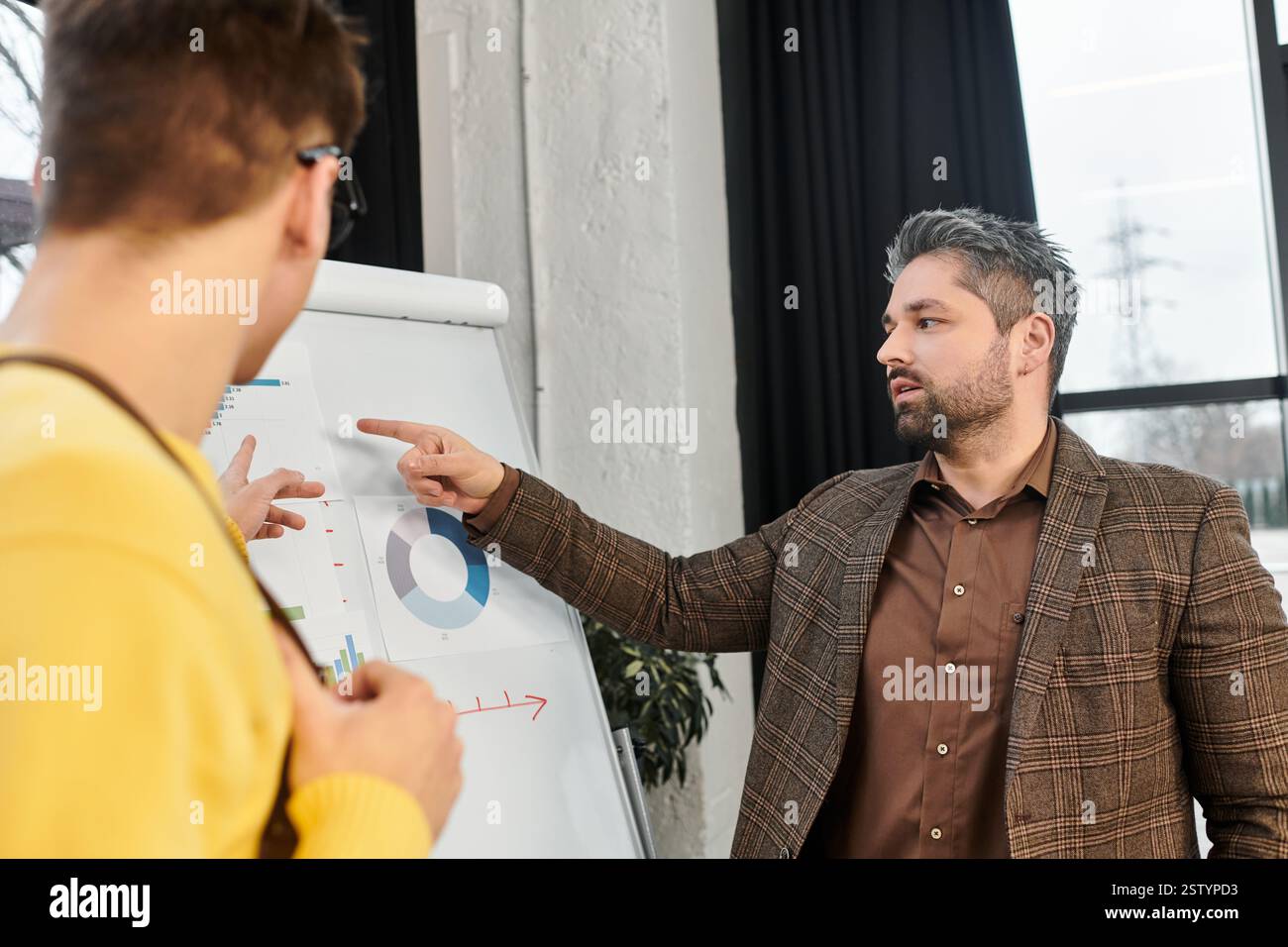 New team members gather for an informative onboarding presentation in a ...