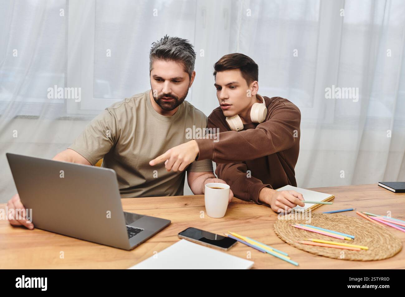 Two brothers engage in an intense brainstorming session while exploring ...