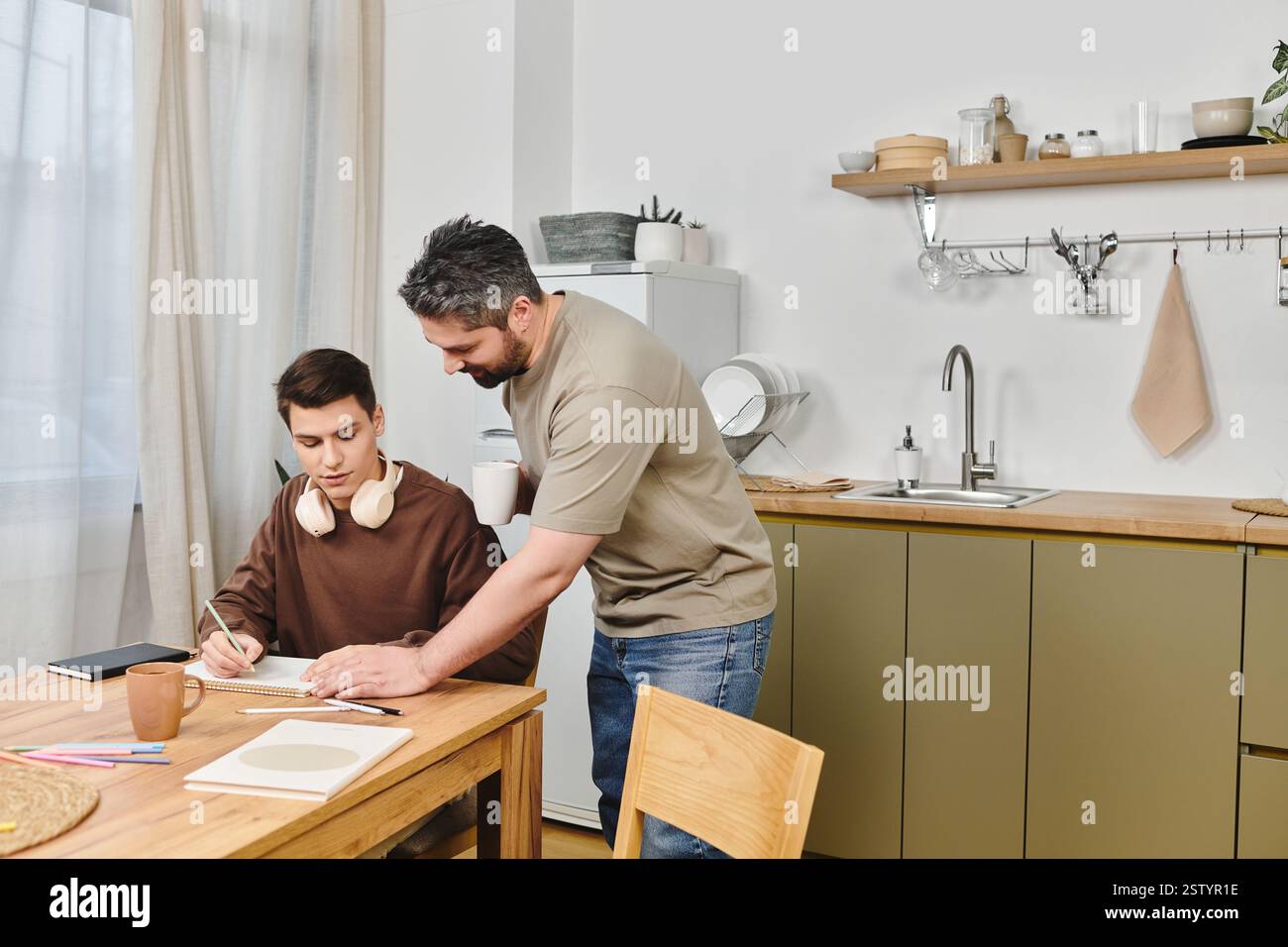Two brothers share a special moment at home, collaborating and enjoying ...