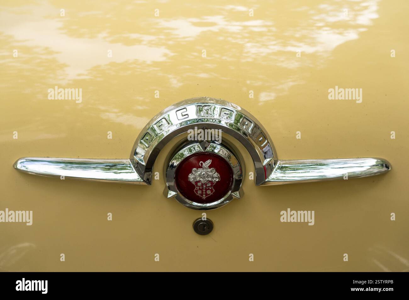 The emblem of a full-size luxury car Packard Cavalier, close-up ...