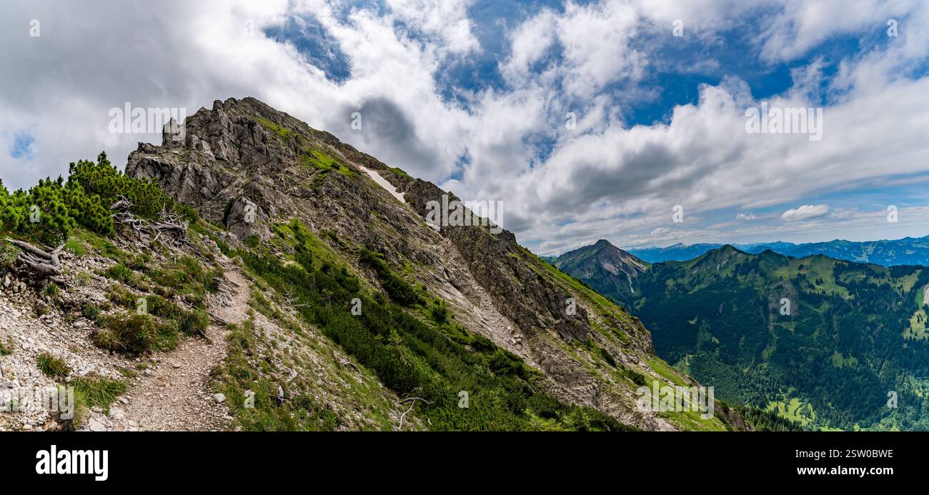 Breathtaking mountain hiking spot offers stunning views of Bavarian Alps and diverse outdoor ...