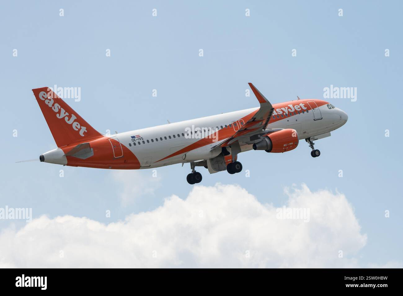 The narrow-body airliner Airbus A320-214 by easyJet Europe Stock Photo ...