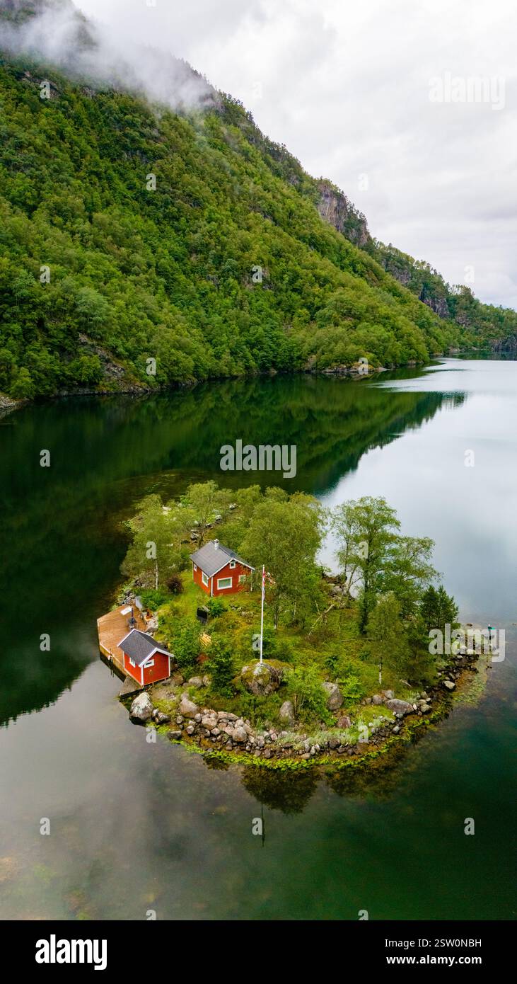 Secluded Red Cabins on a Norwegian Island, Lovrafjorden, Norway Stock ...