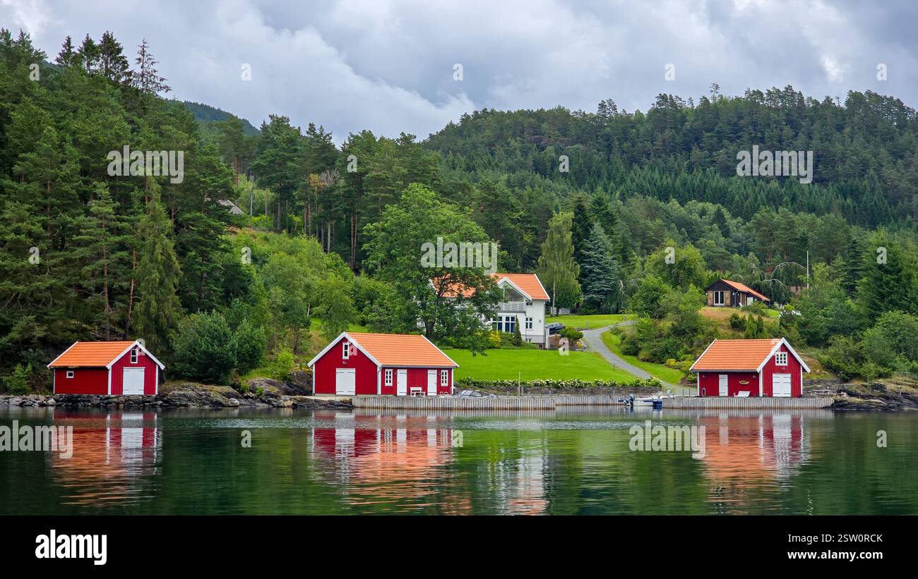 Surrounded by dense forests and hills in norway hi-res stock ...