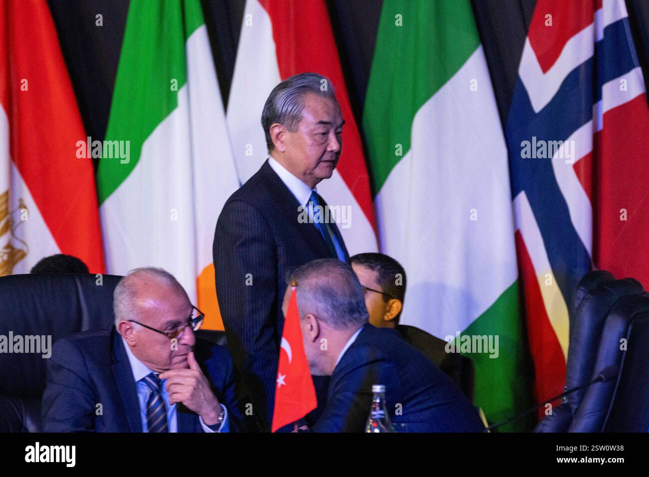 Chinese Foreign Minister Wang Yi arrives at the opening session of the ...