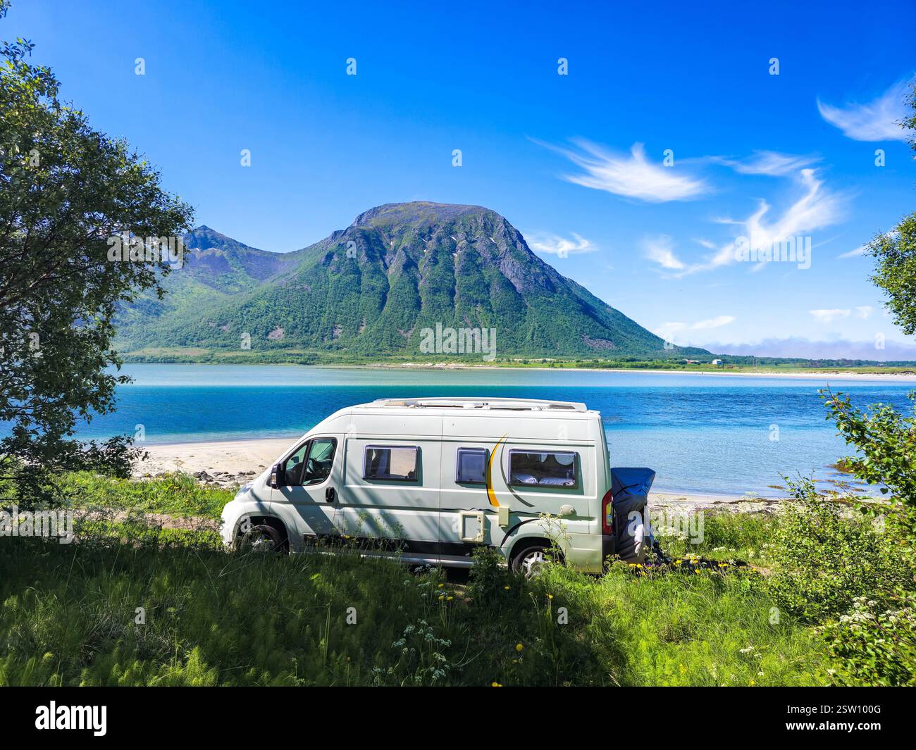 Exploring Norway's Breathtaking Coastline in a Camper Under Clear Blue ...