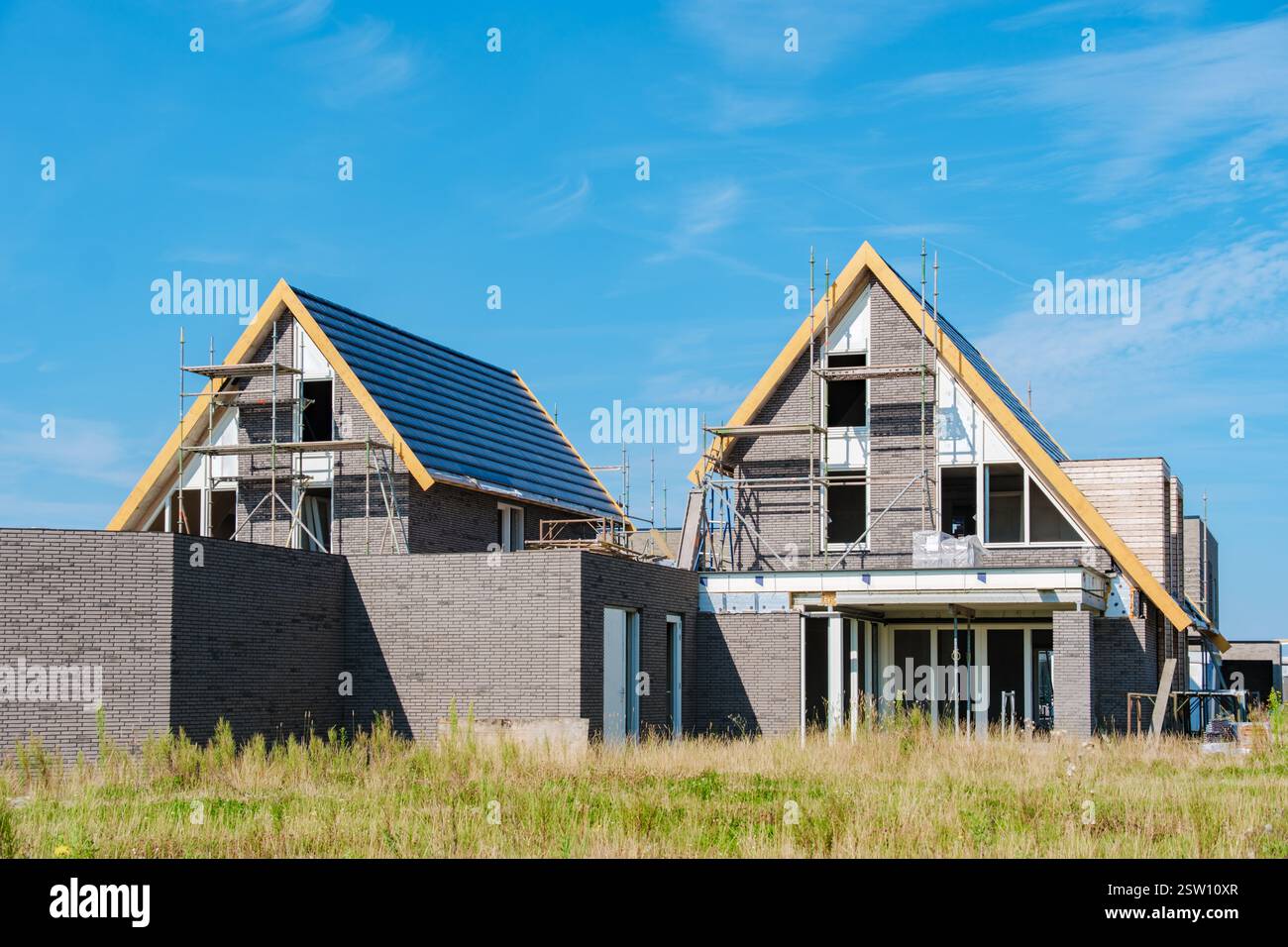 Modern Family Houses Under Construction in Dutch Suburban Area Stock ...