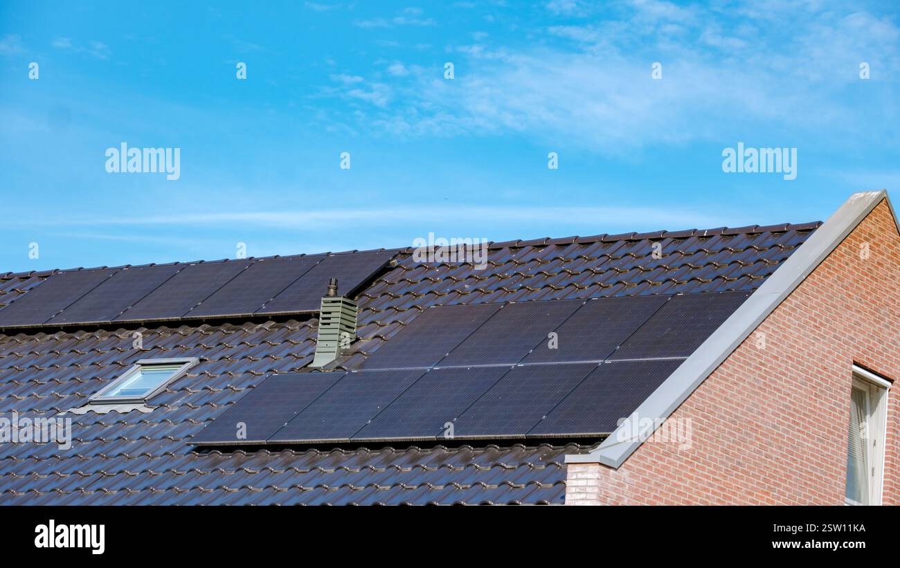 Solar Panels Efficiently Harnessing Sun Energy on a Rooftop Under Clear ...