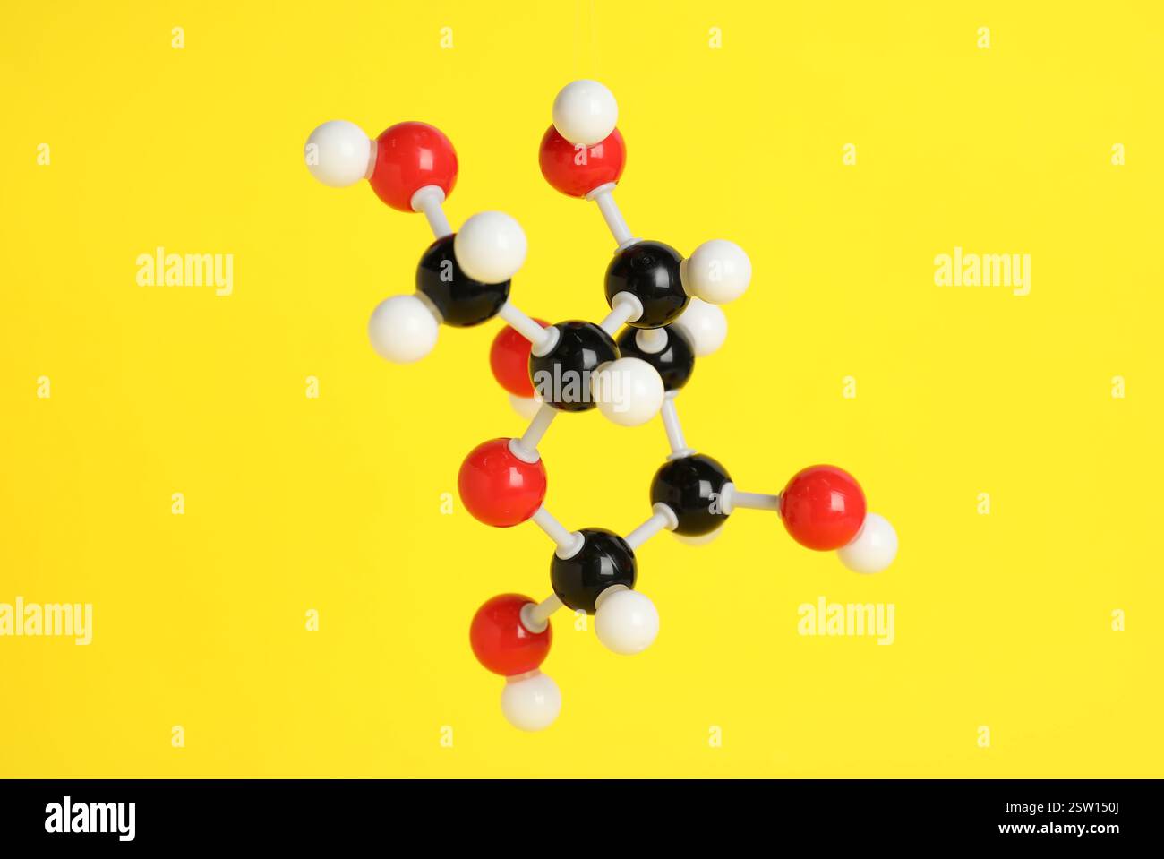 Molecule of glucose on yellow background. Chemical model Stock Photo ...