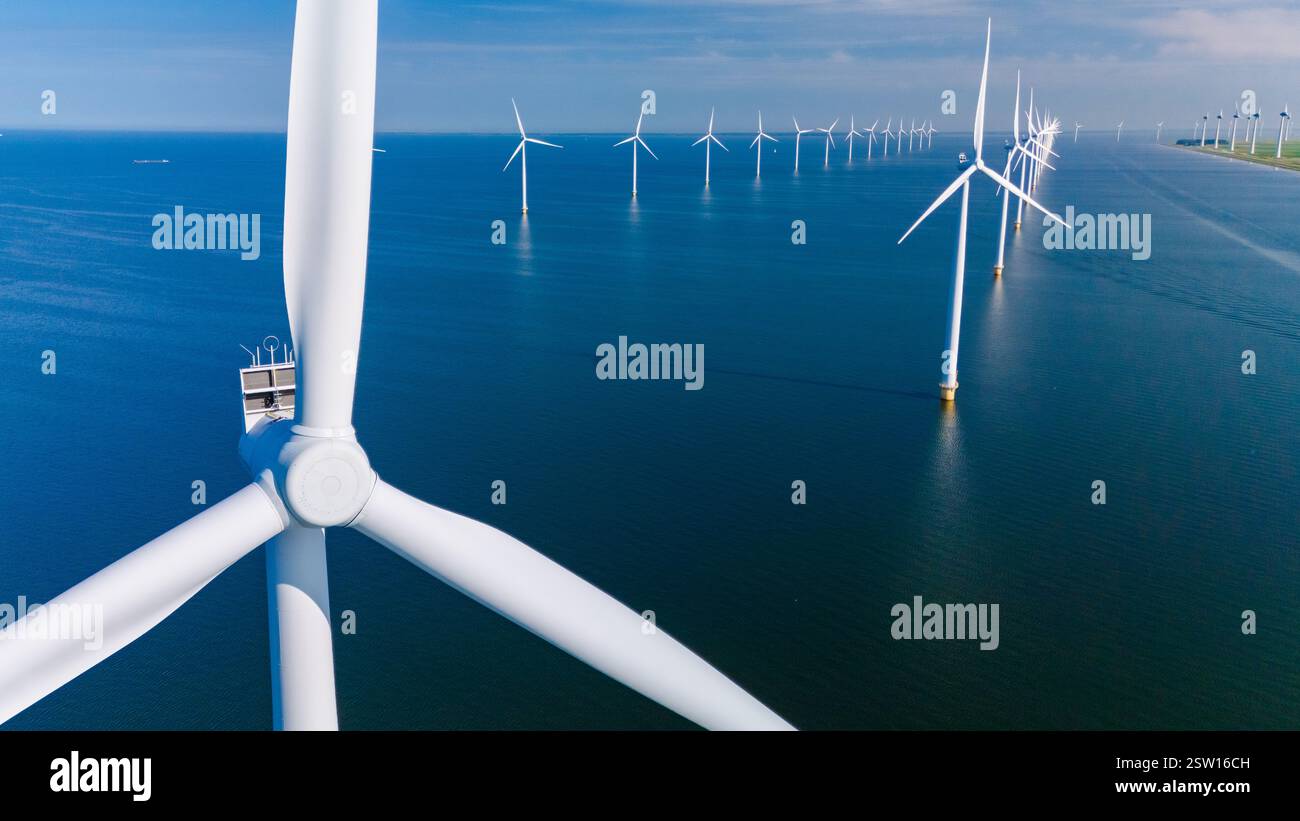 Vast Wind Turbines Harnessing Renewable Energy in Dutch Waters Stock Photo - Alamy