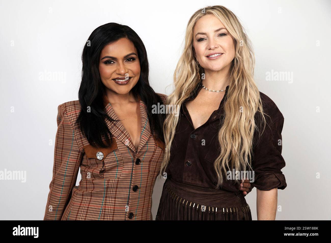Mindy Kaling, left, and Kate Hudson pose for a portrait to promote ...