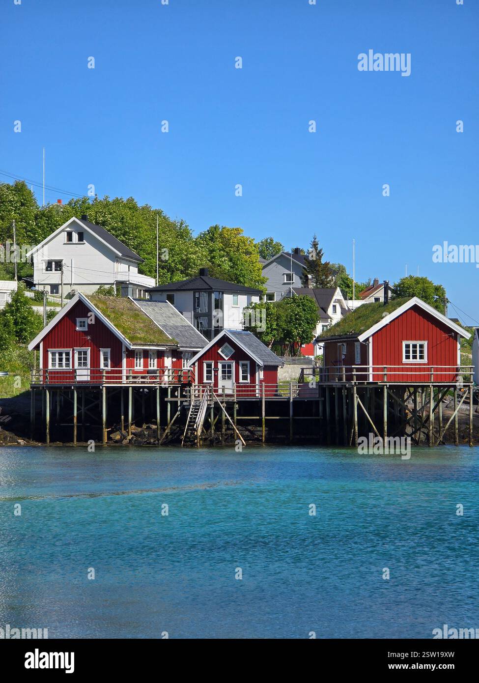 Charming Red Cabins on Stilts by Crystal Clear Waters in Norway's ...