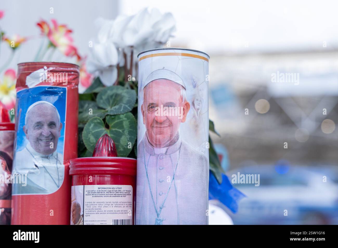Rome, Italy. 20th Feb, 2025. Lights with the effigy of Pope Francis ...