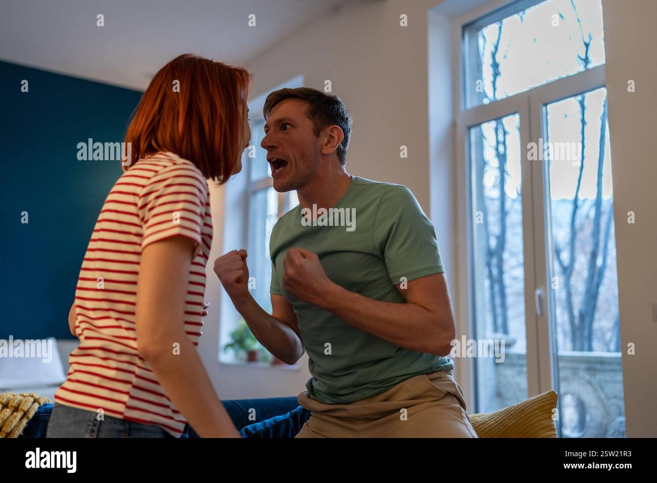 Toxic nervous family relationship. Husband screams hysterically on wife ...