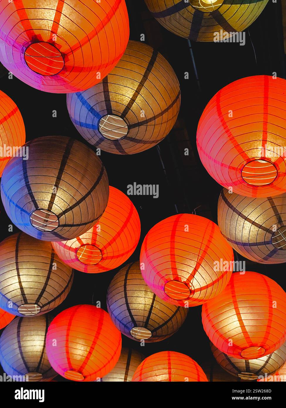 Paper lantern lights dancing above from the ceiling Stock Photo - Alamy