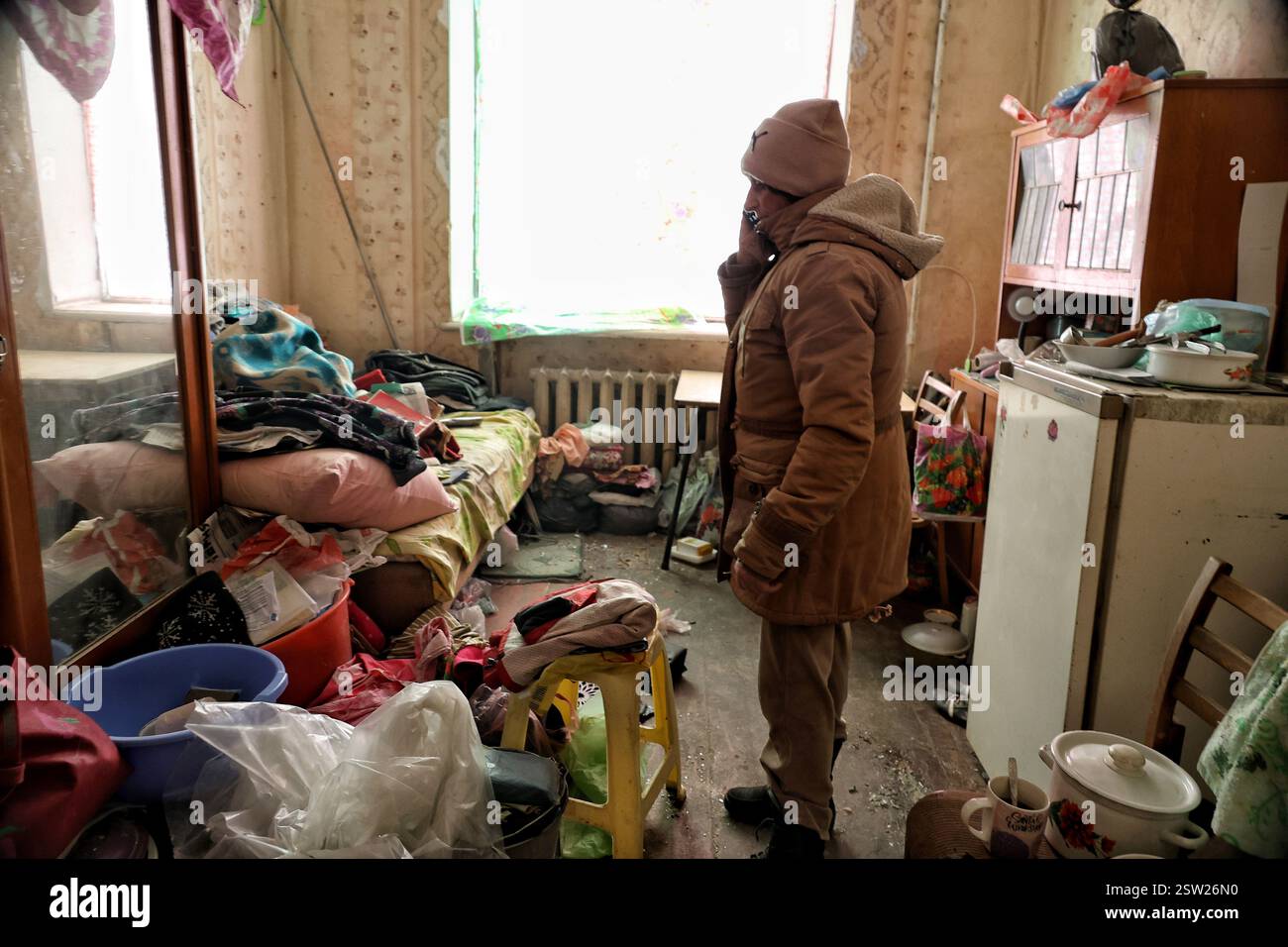ODESA, UKRAINE - FEBRUARY 20, 2025 - A woman is in a room in an ...