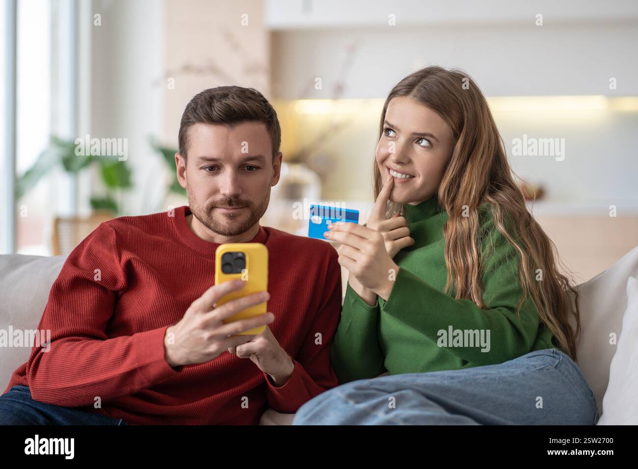 Happy married couple spouses shopping online via internet using ...