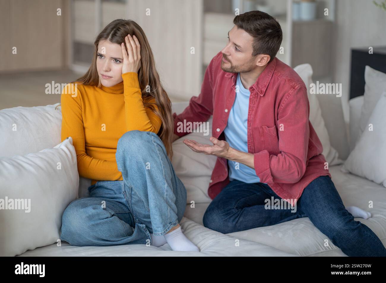 Caring guy trying to explain justify to emotional girl. Offended wife ...