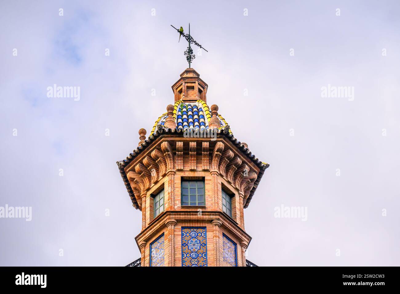 Architectural detail of a decorative tower in the corner of a building ...