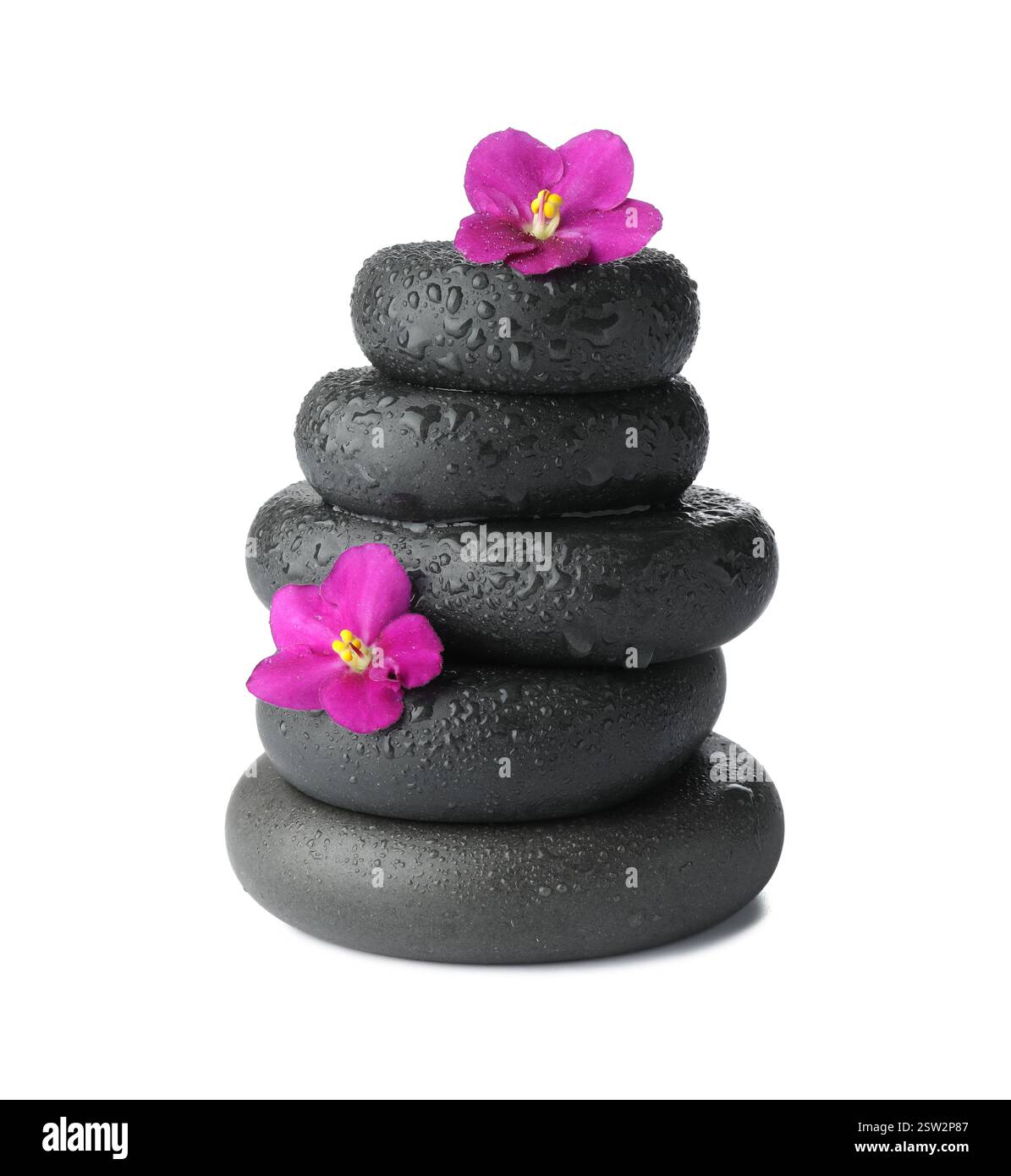 Stacked spa stones and beautiful flowers isolated on white Stock Photo ...